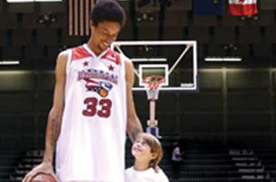 They're here! 7-foot-3-inch Keith Closs stands Thursday with 9-year-old ...