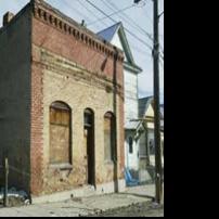 County taking ownership of dilapidated building