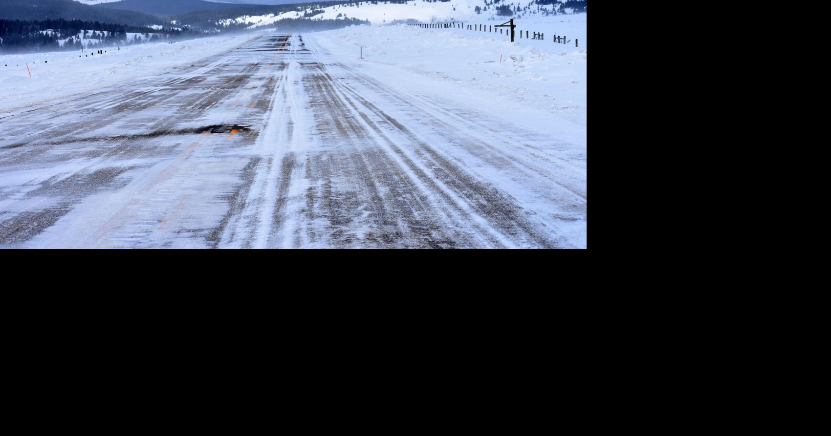 Windrows help contain snowdrifts on windy Mill Creek Road
