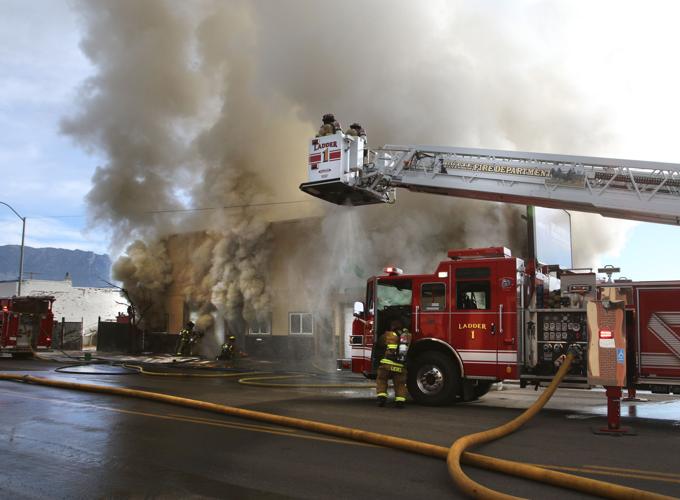 Fire engulfs, destroys Front Street business, sends billows of smoke ...