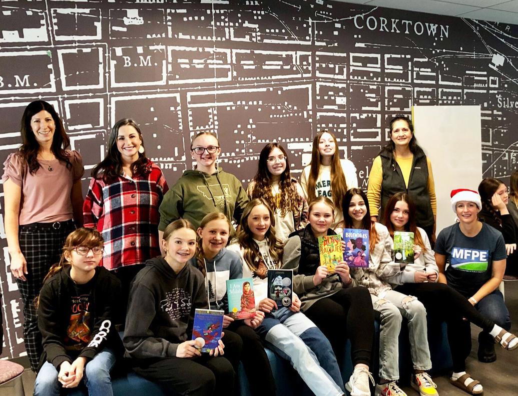 Dozens of books gifted to East Middle School