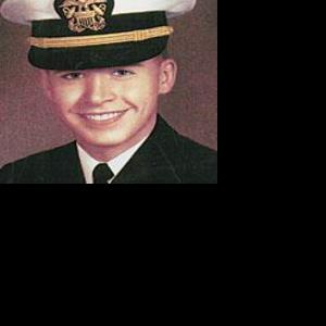 Navy pilot, brother, son still missed
