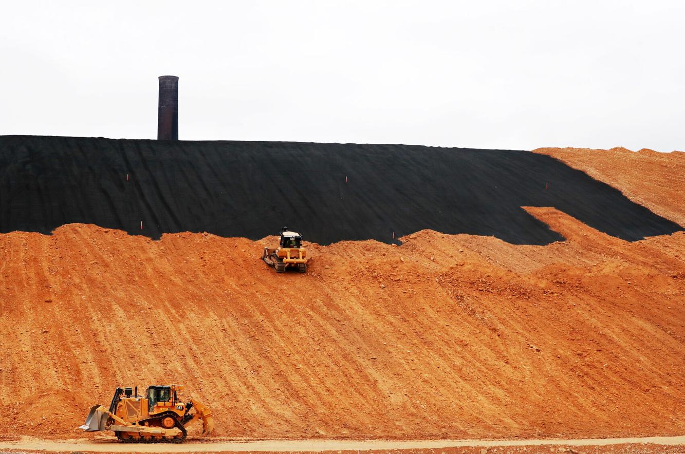Work to cover black slag east of Anaconda resumed recently
