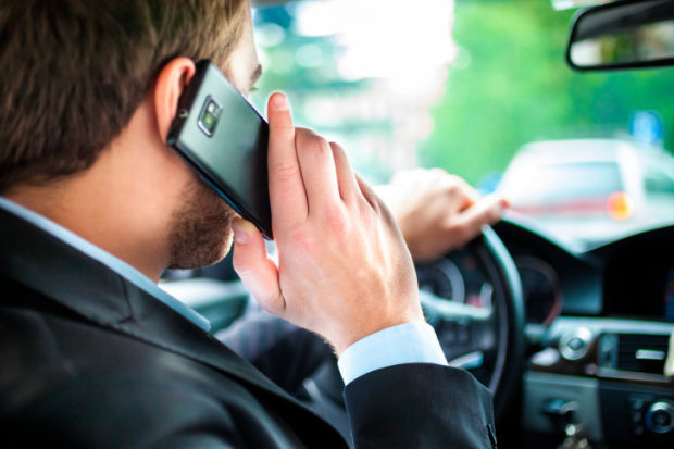 Bill would overturn bans on driving while using cellphones