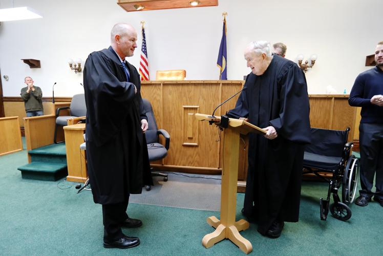 Bob Whelan's father swears him in to District Court bench he once occupied