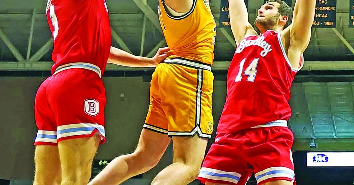 Typical night in Valley; Racer men fight off valiant UofE to keep first ...