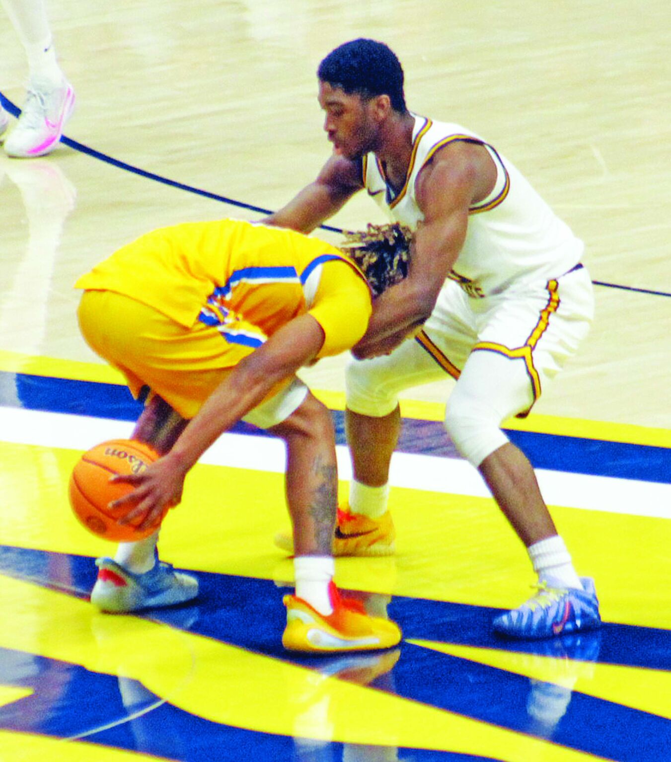 Hello adversity!; Racer men ran into trouble in Iowa by allowing Drake ...