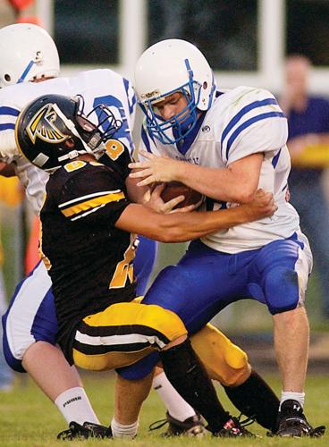 Prep football: Kemp, L-M crush Danville in opener