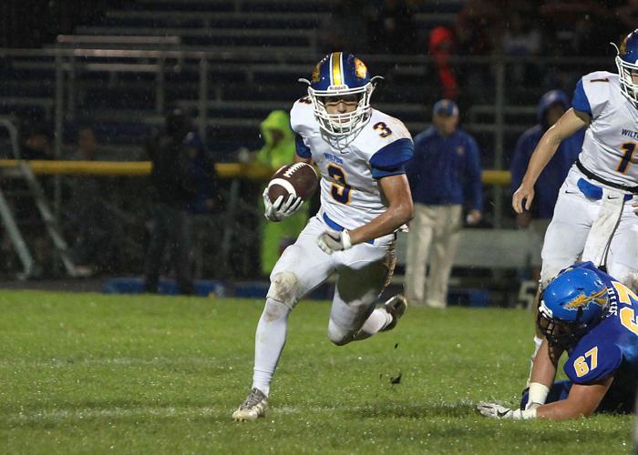 Wilton football bounces back with district win