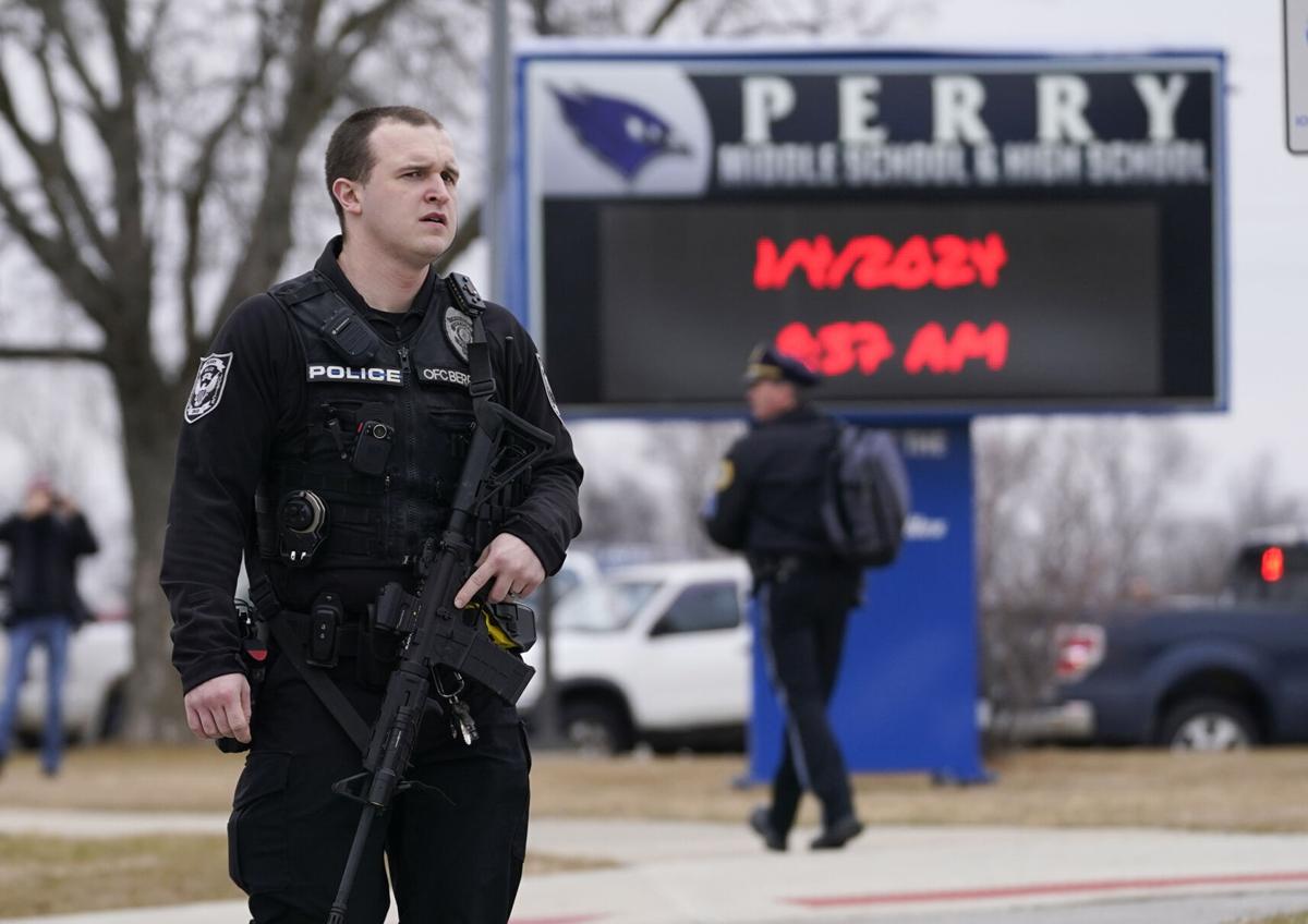 Iowa governor signs bill aiding Perry school after shooting
