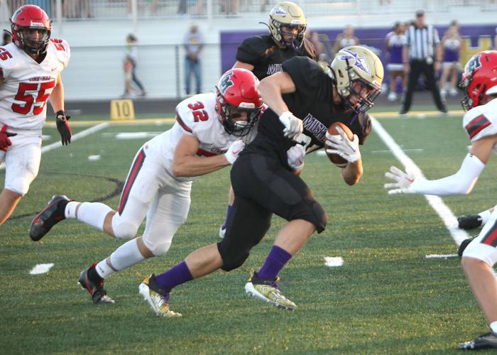 Linn-Mar scores in bunches en route to win over Muskies