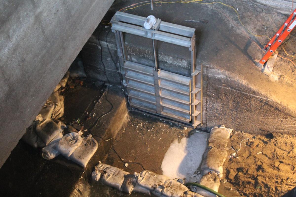 New sluice gate gets installed at Papoose Creek Lift Station just in ...