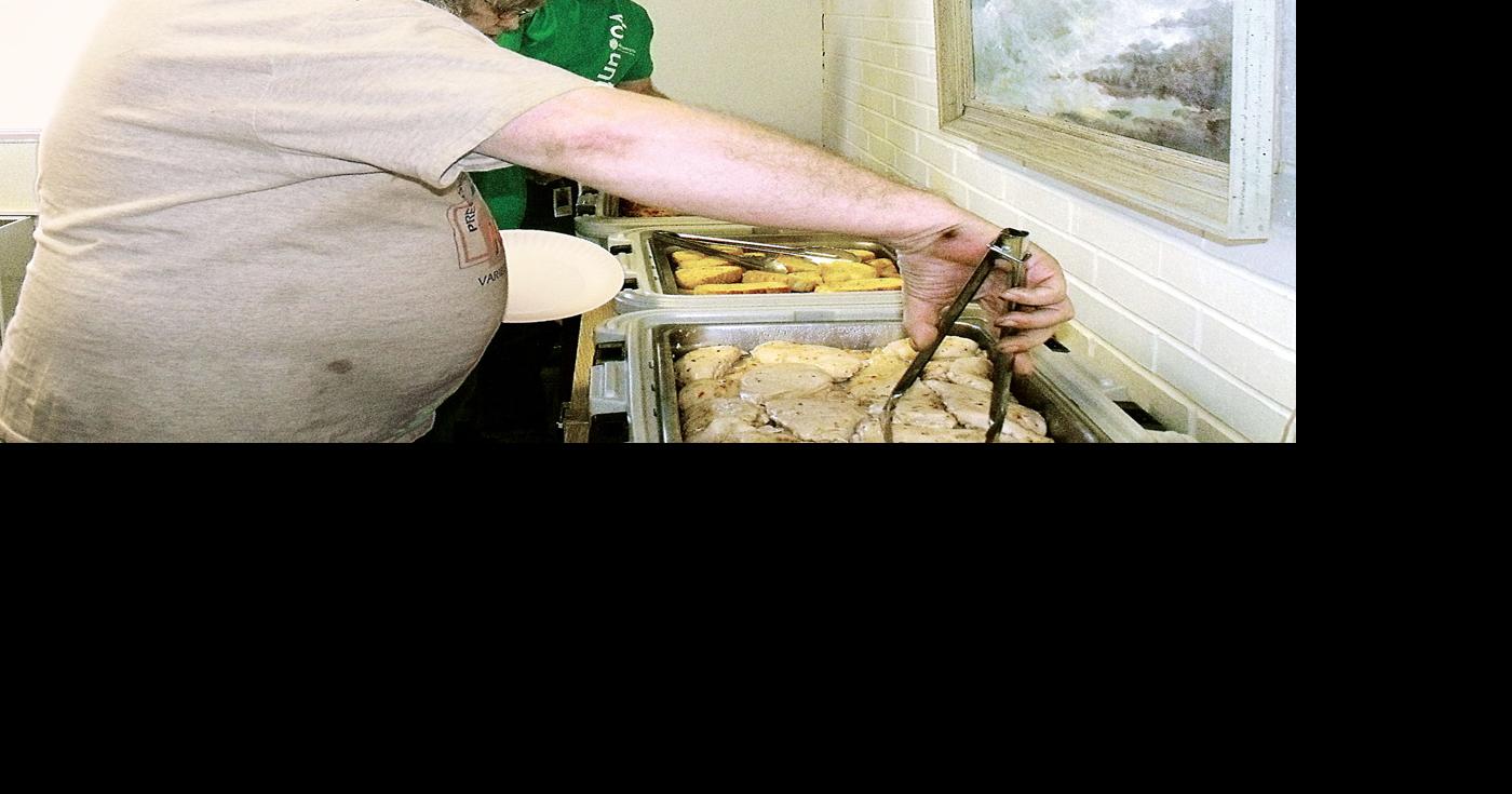 Monsanto shares meal with Muscatine's Center for Social Action