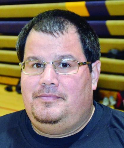 Molding Moses: Pro basketball player Moses Ehambe is working with local ...