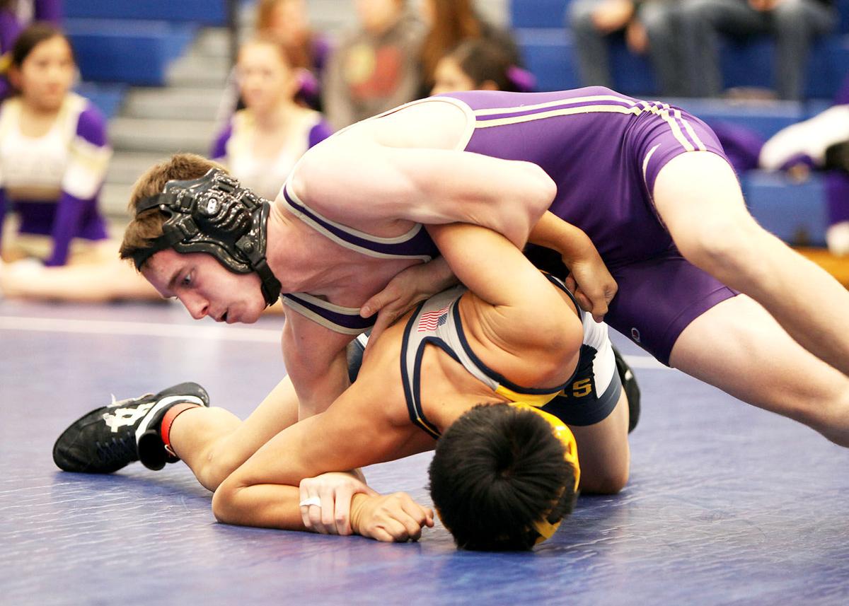 West Liberty wrestling wins big in sweep of Muscatine, Cascade ...