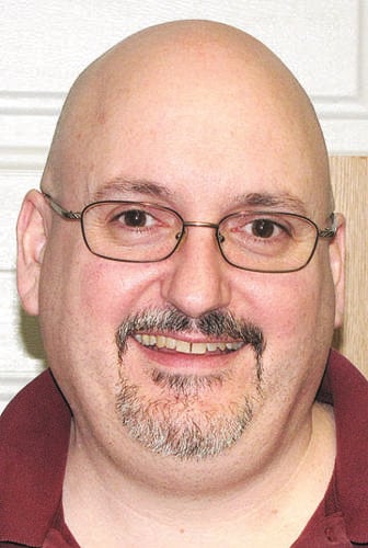 Muscatine craftsman goes from steel to wood