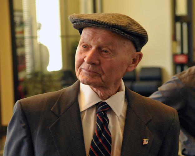 Book recounts extraordinary story of Henry Langrehr, Clinton D-Day veteran