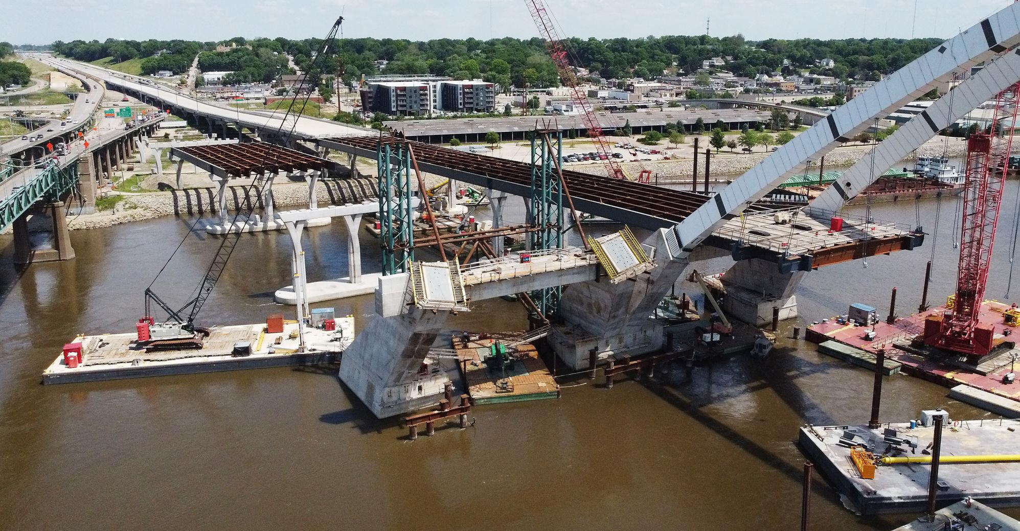 First part of arch floor is raised on I-74 across Mississippi River in ...
