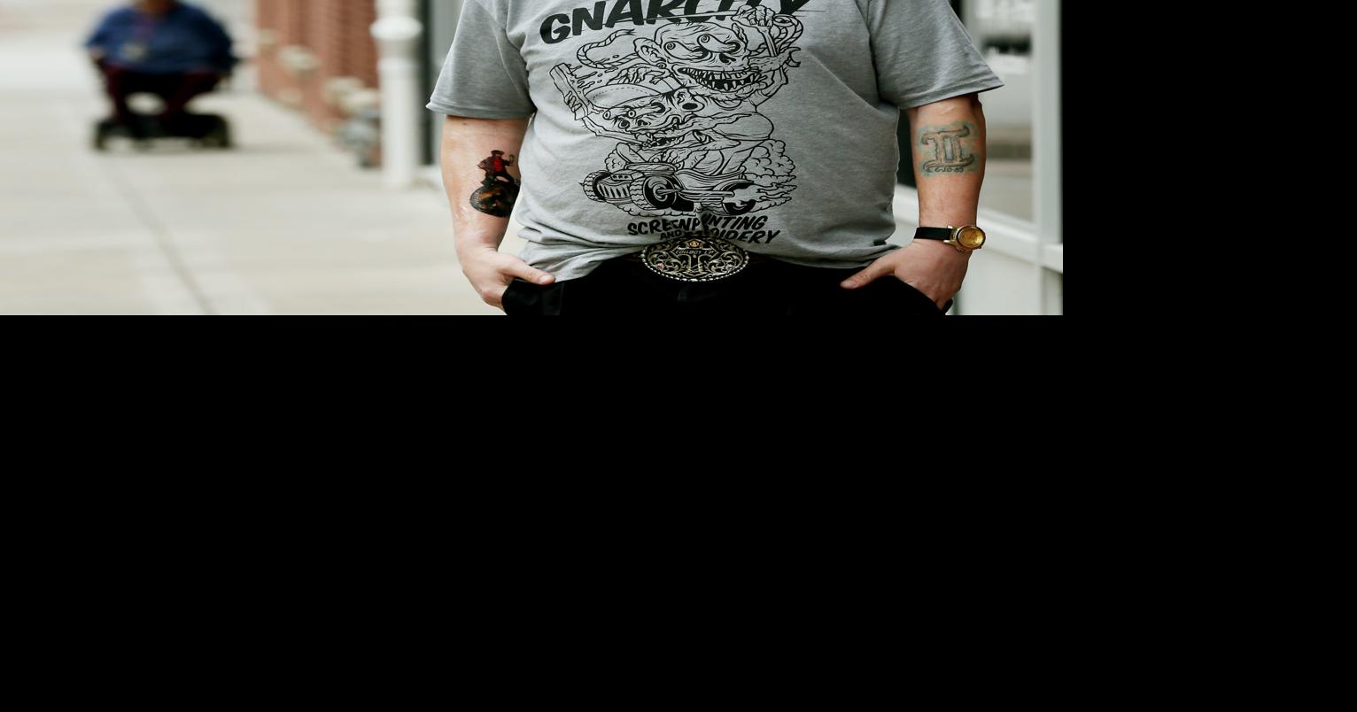 'Fish Guy' swims in celebrity after he carried catfish through downtown ...