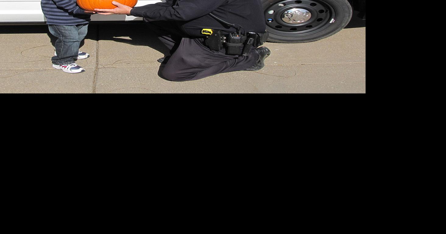 Cop's pumpkin patches boy's first Halloween