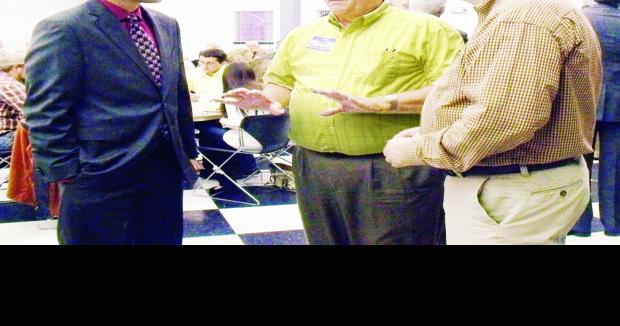 Jeff Kaufmann passes the torch — to light the grill