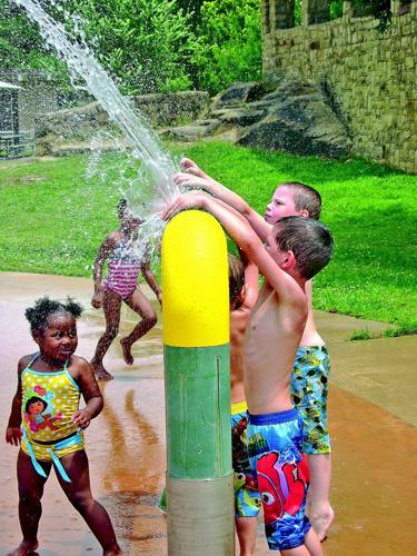 Splash pad draws kids on a hot afternoon | Archives | muskogeephoenix.com