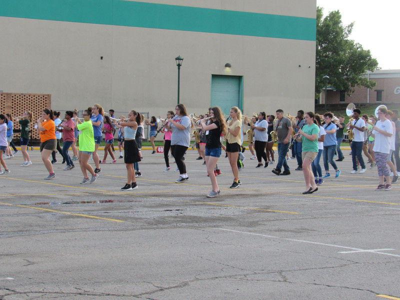 Muskogee High band members practice drills ahead of football season ...