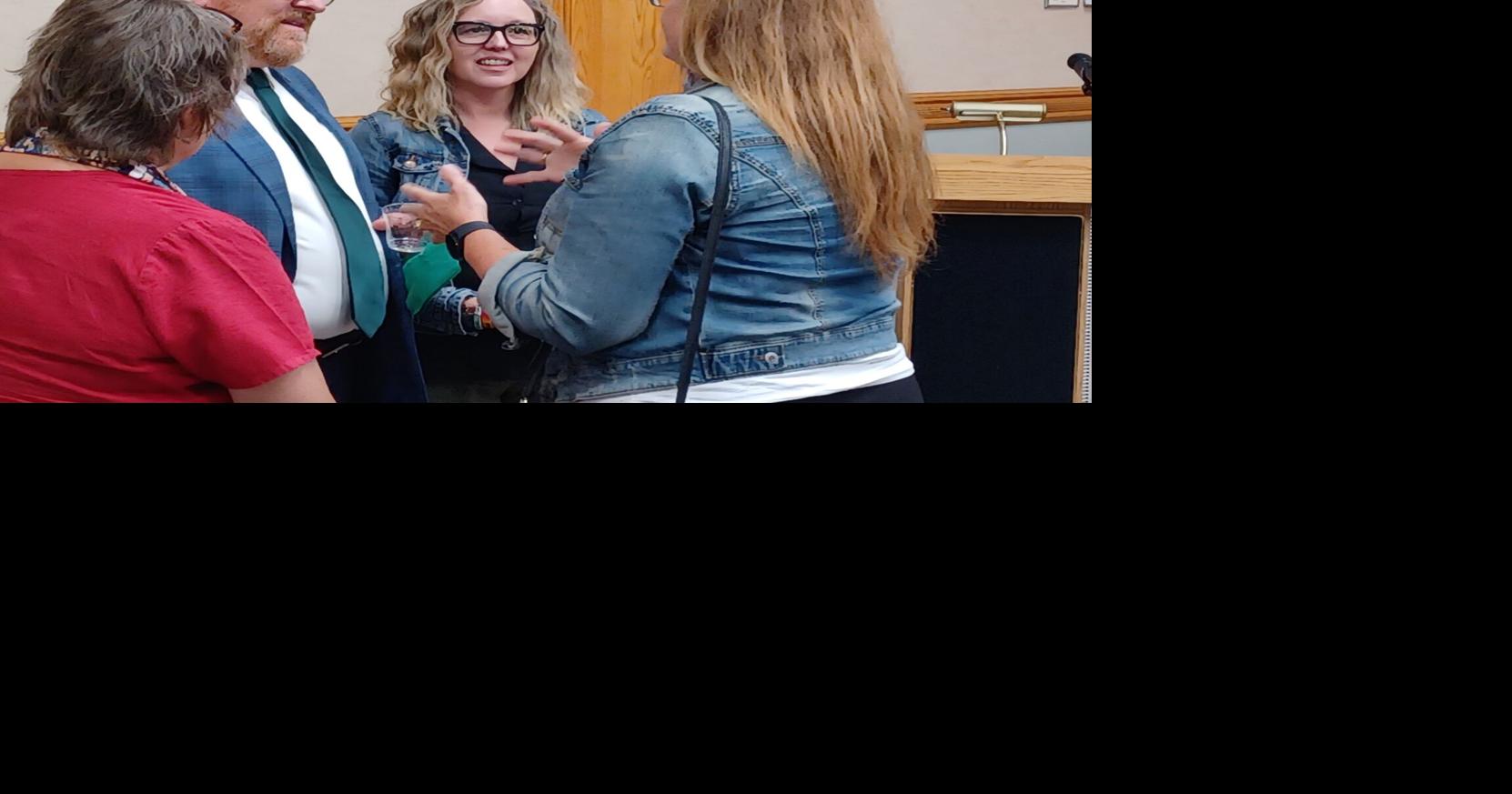 Rodney and Sarah Hanley talk with local community members ...