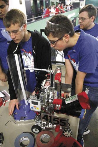 High school students join in robotics battle | Local News ...