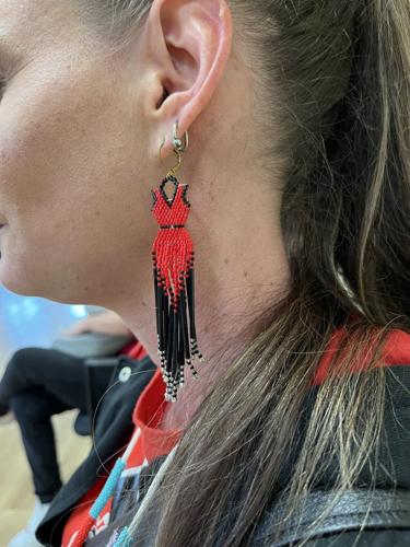 Wahta Mohawk members march in solidarity on Red Dress Day