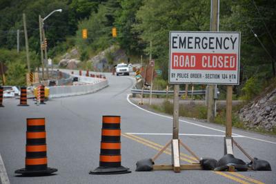 Motorists avoiding warning signs; still crossing Rosseau Bridge