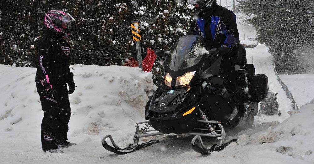 Snowmobile road crossing a challenge