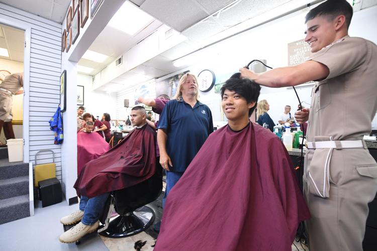 Photos: Fish Haircuts | Texas A&M News | myaggienation.com