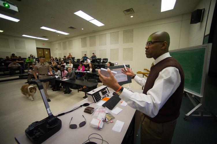 Dropping science: A&M sociology professor doubles as campus rapper ...