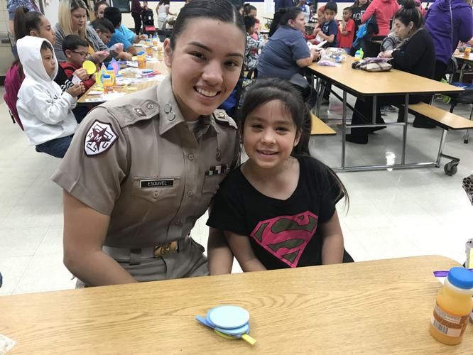Corps cadets stand in at 'Memories with Mom' at Navarro Elementary ...