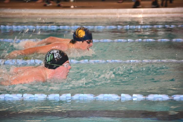 Shorthanded Trojans swim past Queen Anne's neighbors | High Schools ...