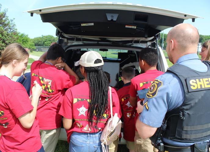 Students learn about law enforcement during DARE Day | News ...