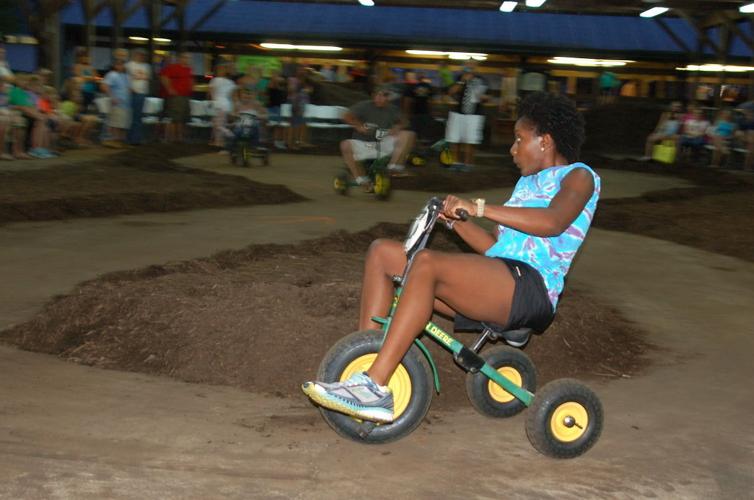 Adults compete in Tricycle Races at QA Fair | News | myeasternshoremd.com