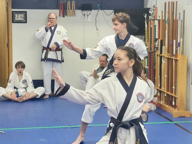 Power, balance and discipline displayed during black belt testing ...