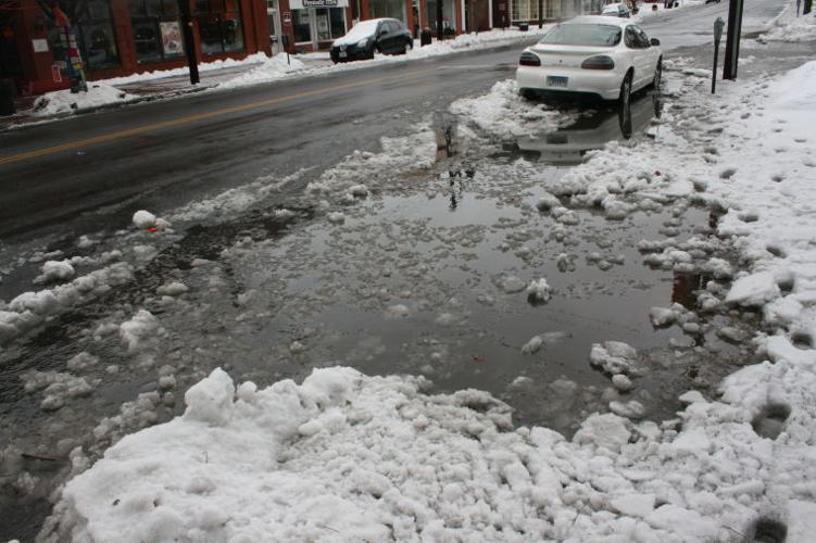 Plop! Heavy, wet snow – but not as much as feared | Kent County ...