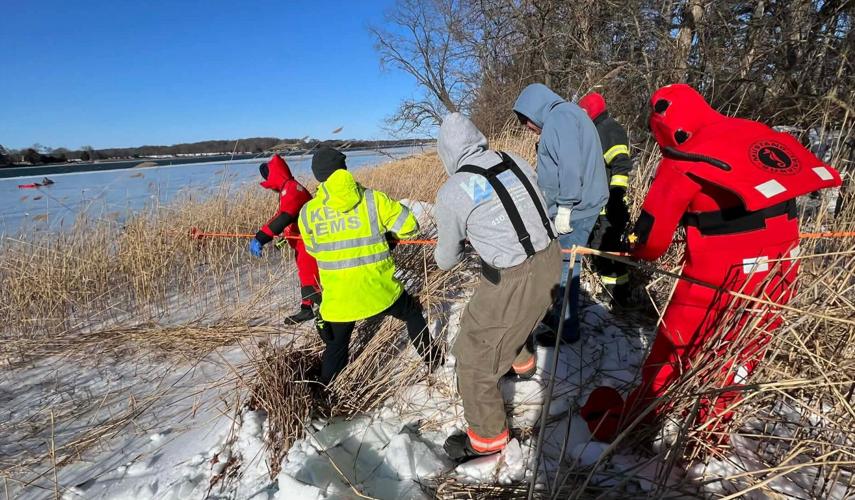Firefighter crawls 350 feet across ice to rescue stranded hunter | News ...