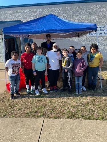 Hurlock's Young Gentlemen help with drive-thru food pantry | News | myeasternshoremd.com