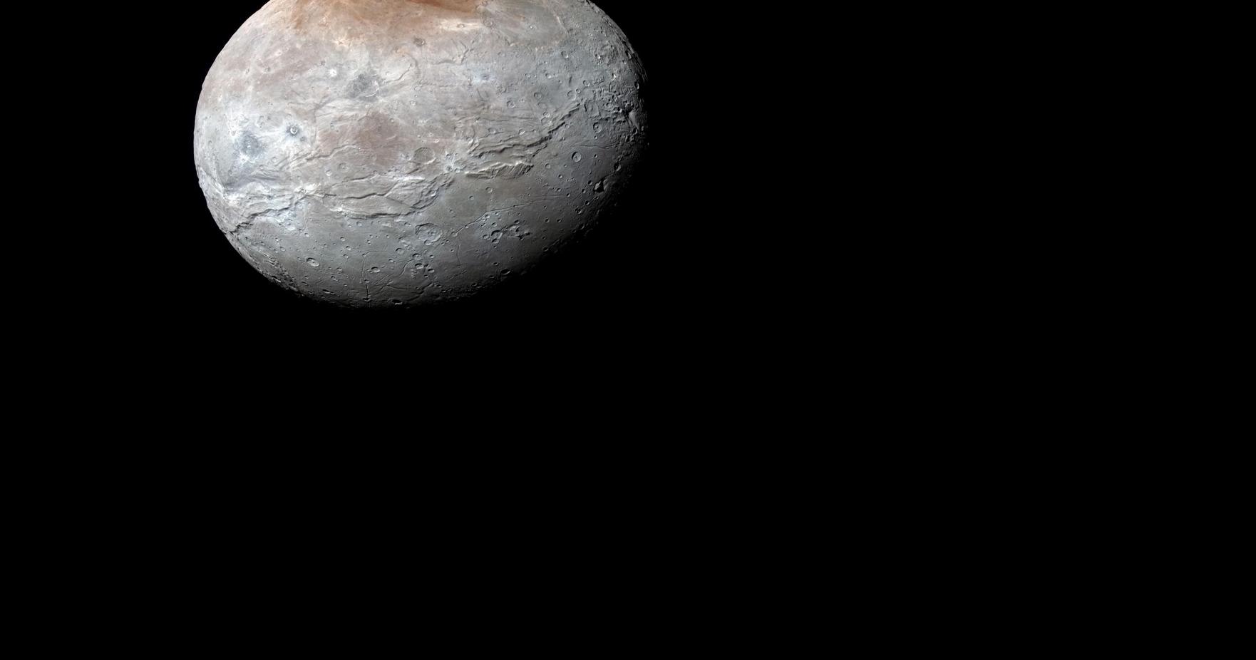 Pluto May Have Captured Its Biggest Moon After an Ancient Dance and ...