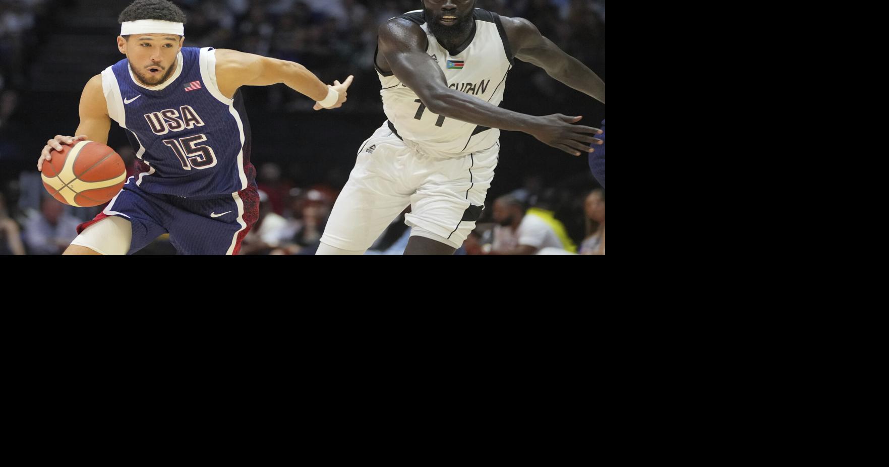 Will Devin Booker’s ‘unsung’ effort in Paris earn the Suns guard more ...