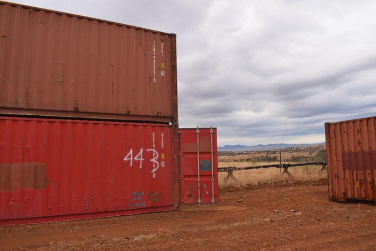 Activists stall construction of shipping container wall at border ...