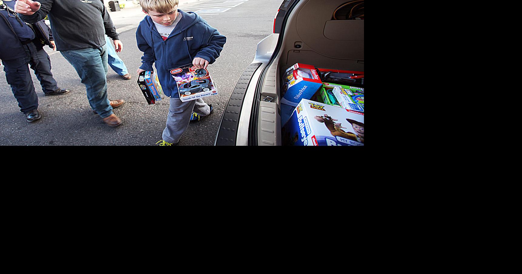 First responders ‘Pack the Penske’ for toy drive | Community ...