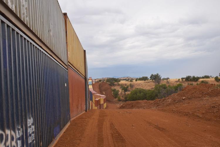 Activists stall construction of shipping container wall at border ...
