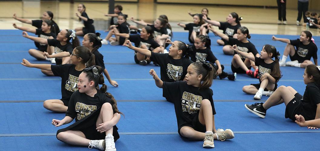 Douglas alum Erika Urquijo-Ruiz returns to lead Bulldogs cheer program ...