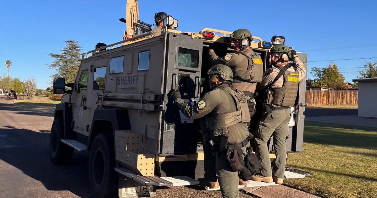 Law enforcement surrounds home of Douglas Police officer in crisis ...