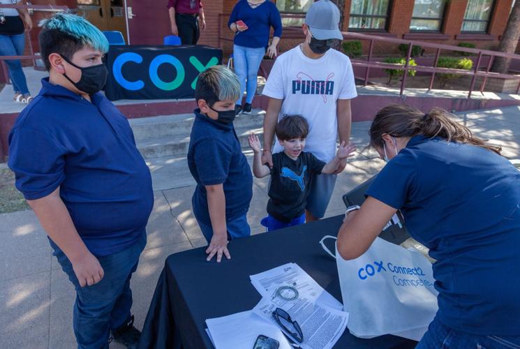 Cox donates 30 laptops to Sarah Marley students | Douglas Dispatch ...